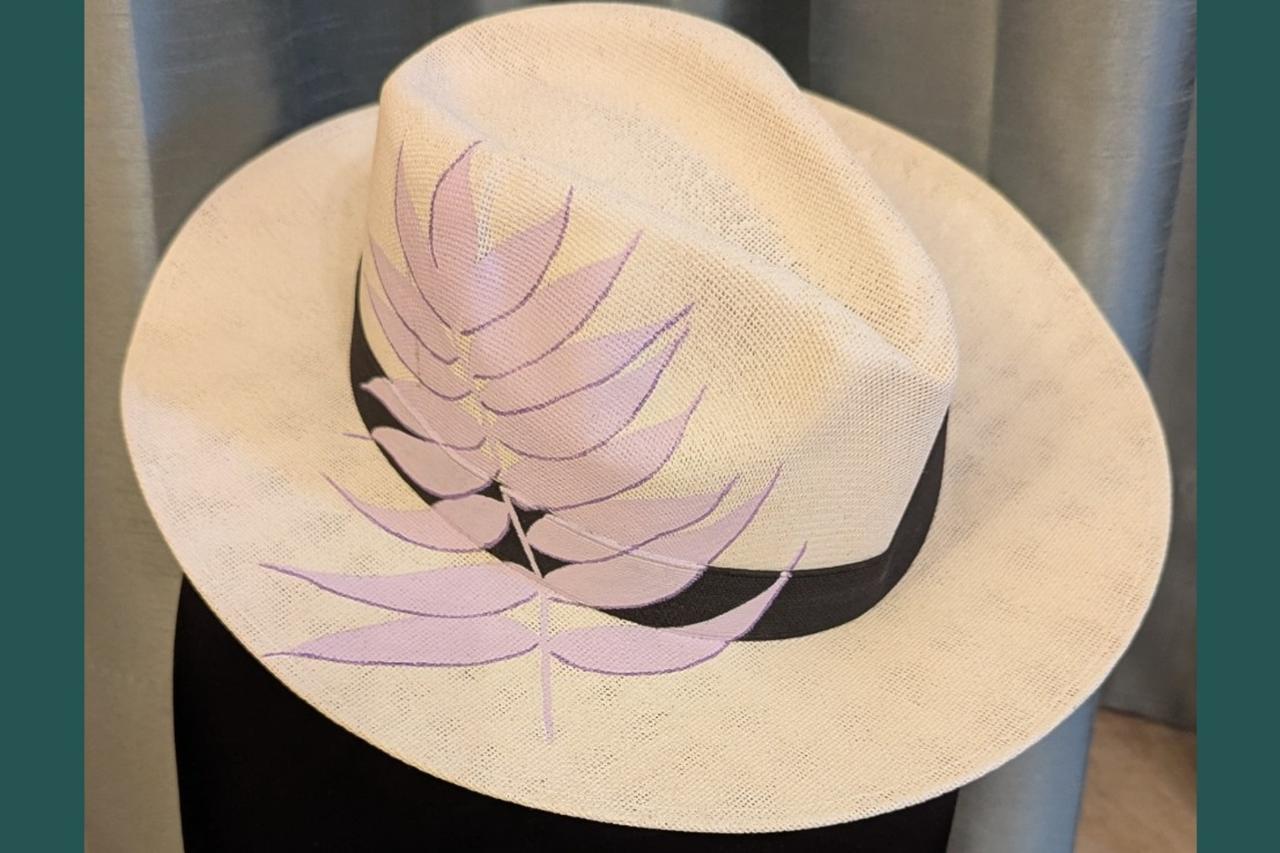 Top off look with hand painted Panama hat | Powered by Givergy